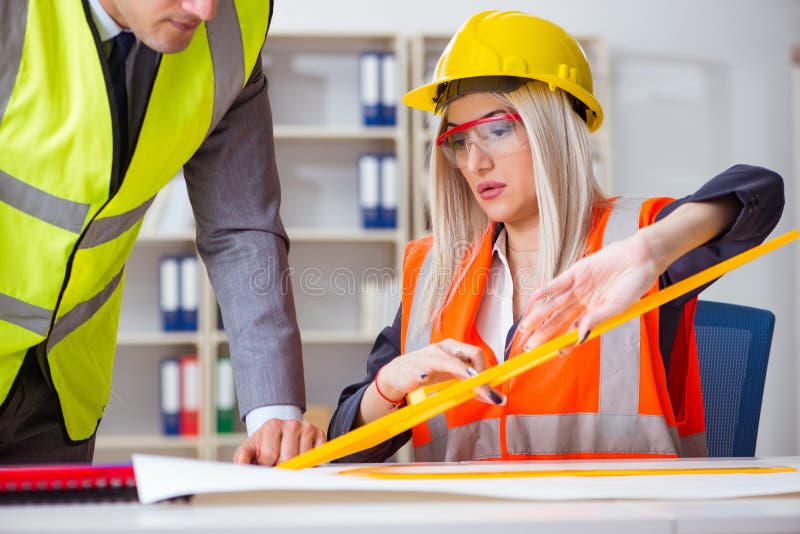 Construction Workers Having Discussion in Office before Starting Stock ...
