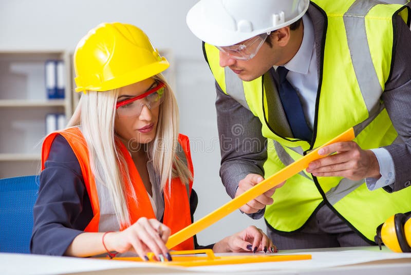 Construction Workers Having Discussion in Office before Starting Stock ...