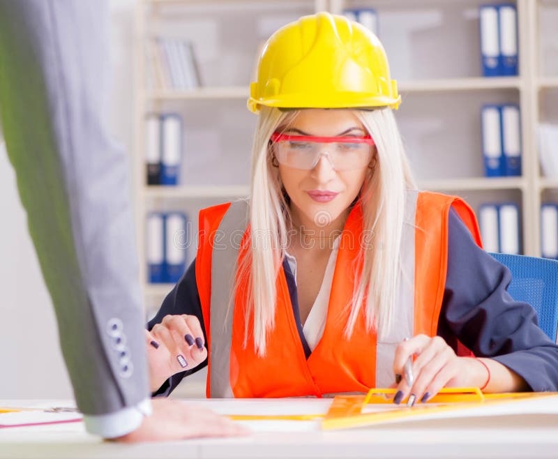 Construction Workers Having Discussion in Office before Starting Stock ...