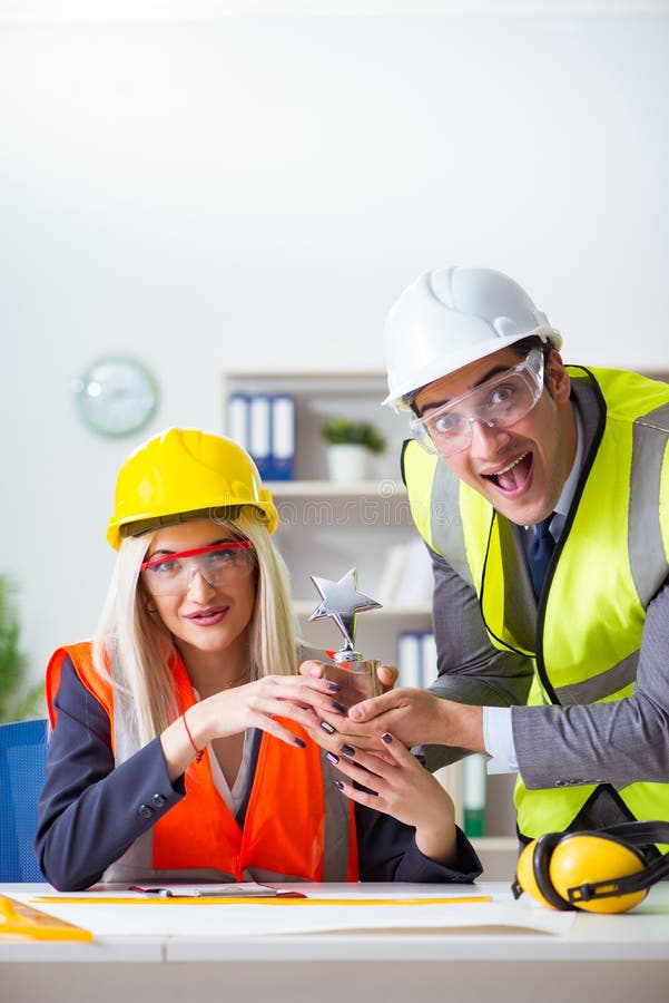 Construction Workers Having Discussion in Office before Starting Stock ...