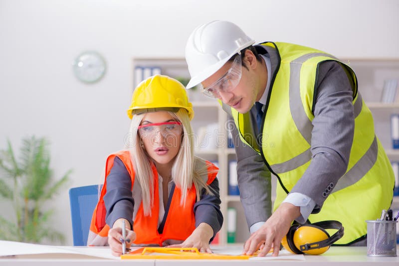 Construction Workers Having Discussion in Office before Starting Stock ...