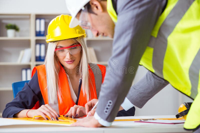 Construction Workers Having Discussion in Office before Starting Stock ...