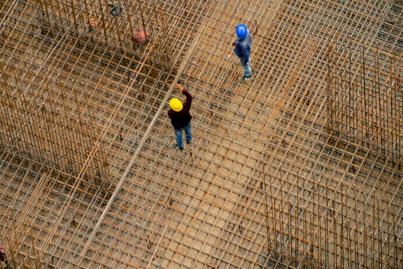 Construction Workers in India Standing on a Rebar Reinforcing Bar ...