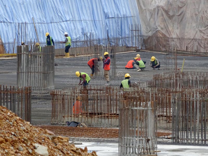Construction Workers Install Reinforcement Bars at the Construction ...