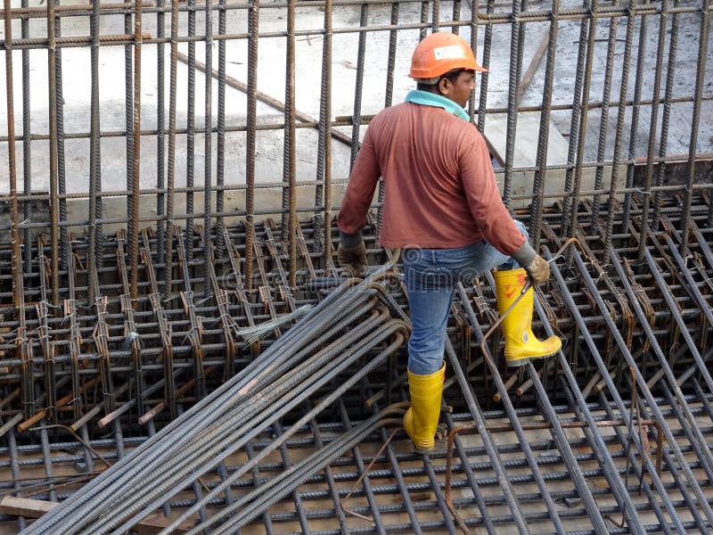 Construction Workers Install Reinforcement Bars at the Construction ...