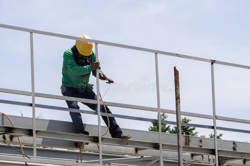 A Construction Workers Installing Beam Formwork. Formwork is Located at ...