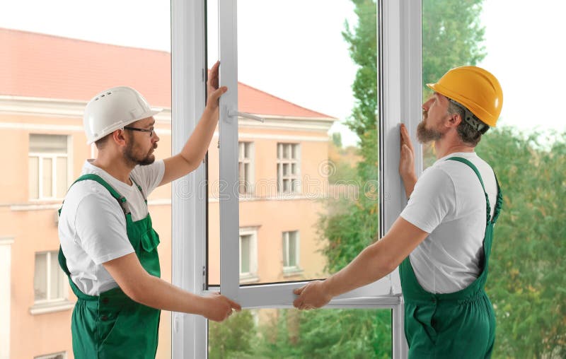 Construction Workers Installing New Window Stock Image - Image of build ...