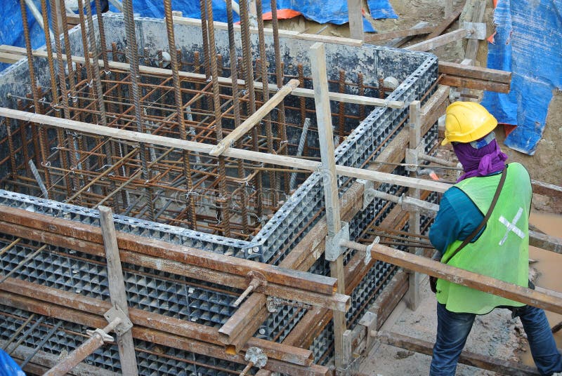 Construction Workers Installing Pile Cap Formwork Made from Polymer at ...