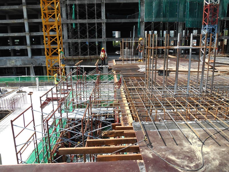 Construction Workers Installing Reinforcement Bar at the Construction ...