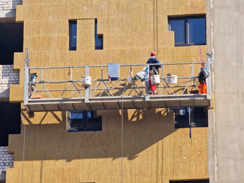 Construction Workers Insulate the Facade of an Apartment Building Stock ...