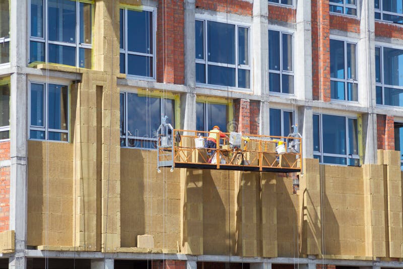 Construction Workers Insulating House Facade. External Wall Insulation ...