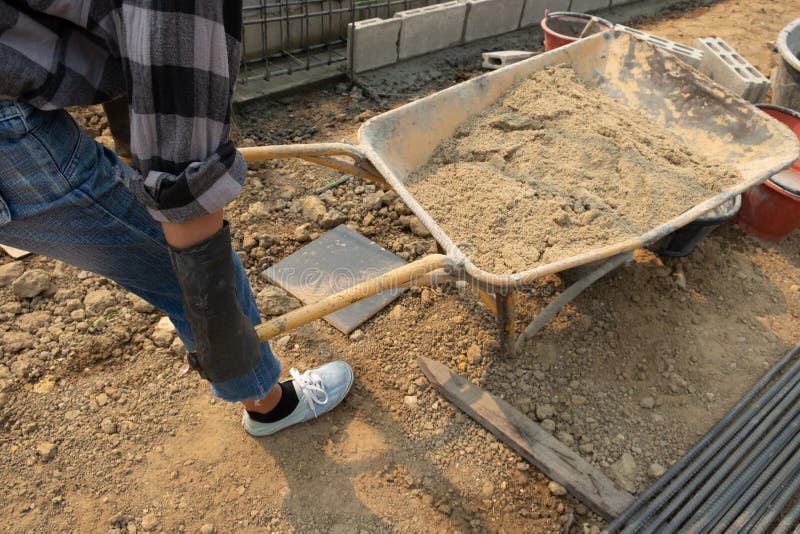 Construction Laborer Team Working On High Ground Building Commercial In ...