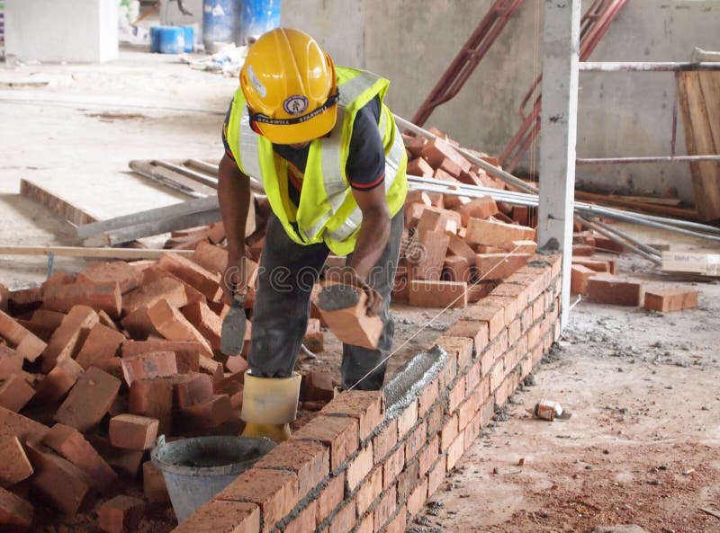 Construction Workers Laying Bricks at Construction Site Editorial Photo ...
