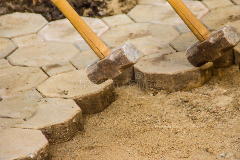 Construction Workers are Laying Concrete Pavement Stone for Footpath ...