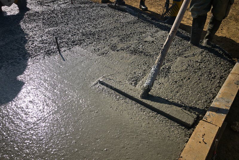 Construction Workers Level Freshly Cast Concrete with Bull Float Stock ...
