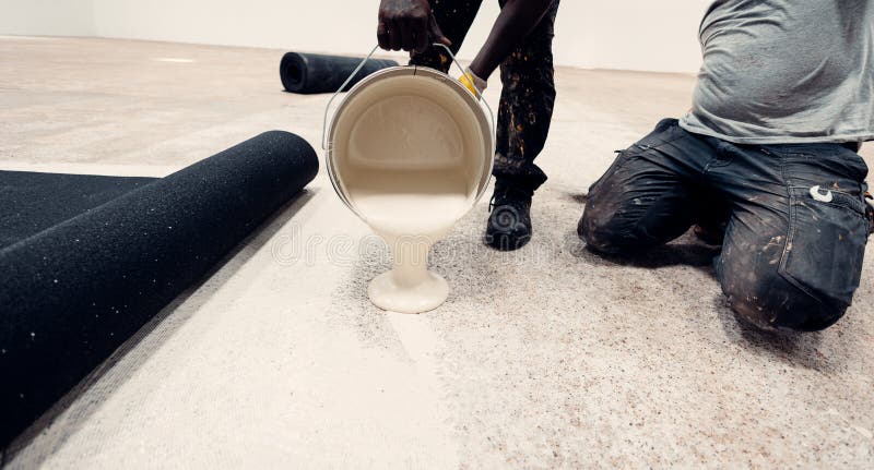 Construction Workers Pouring Self Leveling Concrete on the Floor Stock ...