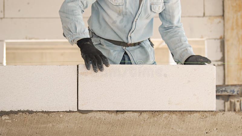 Construction Workers are Making White Lightweight Concrete Blocks that ...