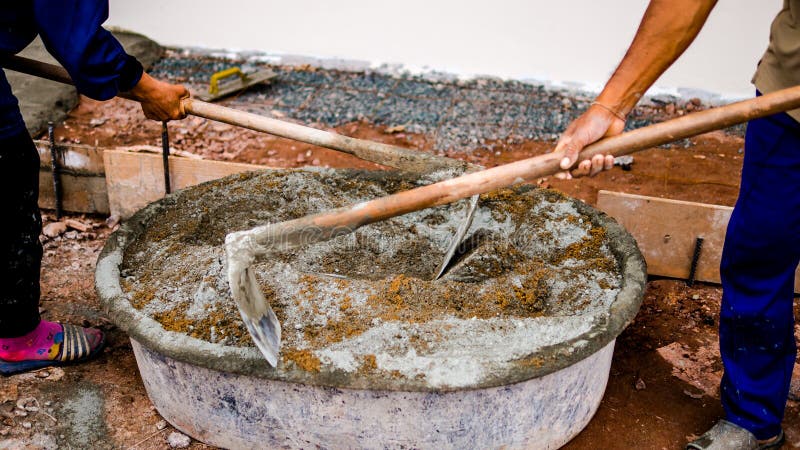 Construction Workers are Mixing Concrete Cement and Sand. Stock Photo ...