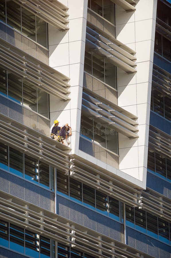 Construction Workers on New Building Editorial Photo - Image of ...