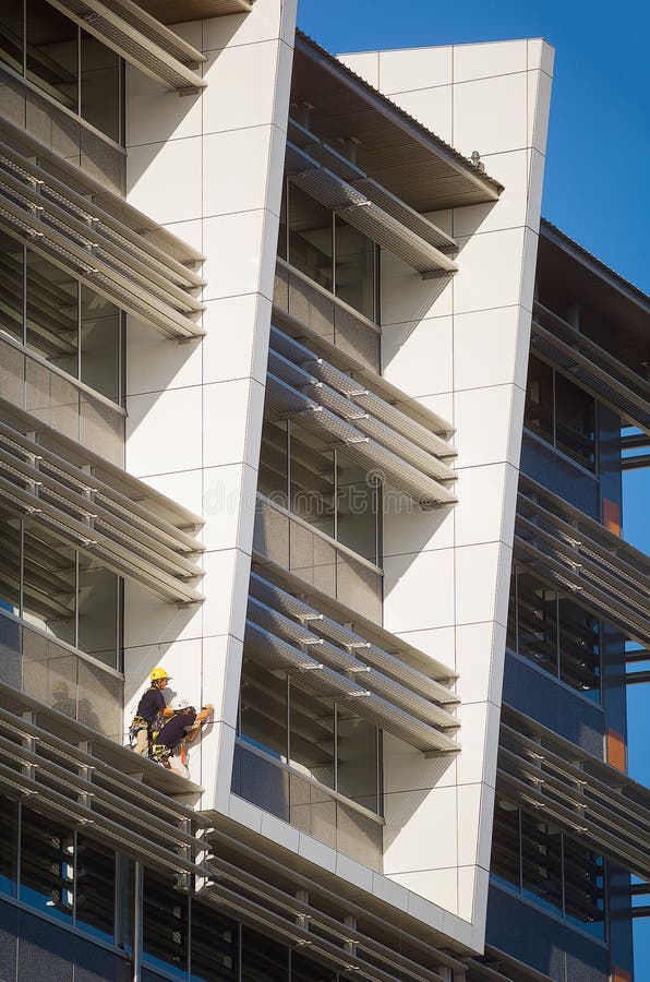 Construction Workers on New Building Editorial Photo - Image of modern ...