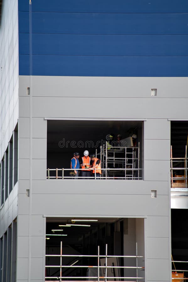 Corby, United Kingdom - June 27, 2025. Construction Workers Inside a ...
