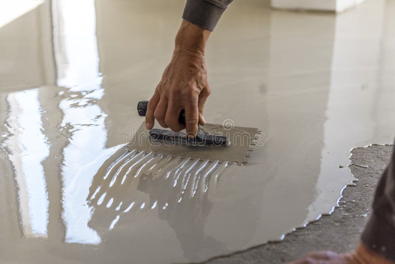 Grey Self-leveling Screed, New Floor Layer, Man Hand Stock Photo ...
