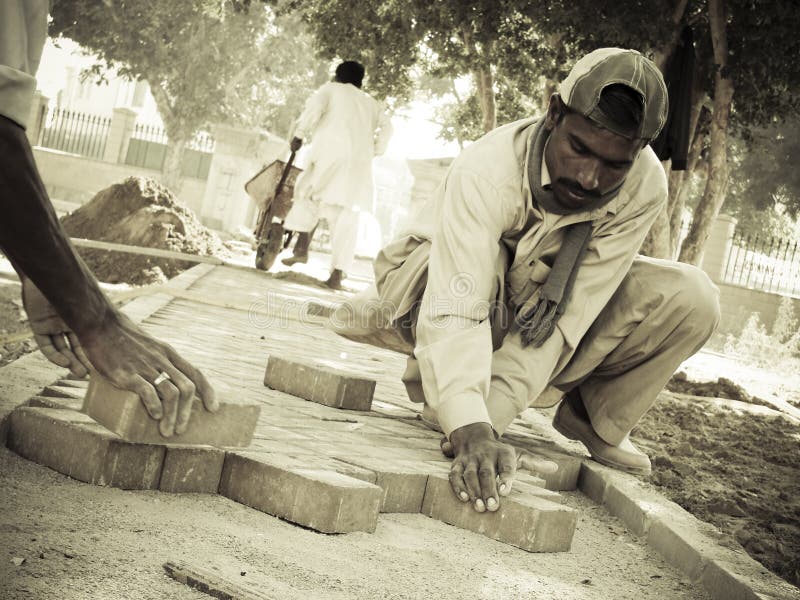 Construction Workers in Pakistan Editorial Image - Image of rows, asian ...