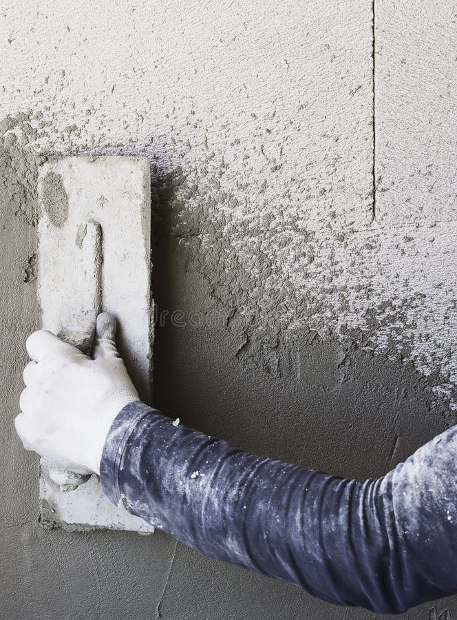 Construction Workers Plaster the Facade of the House. Stock Photo ...