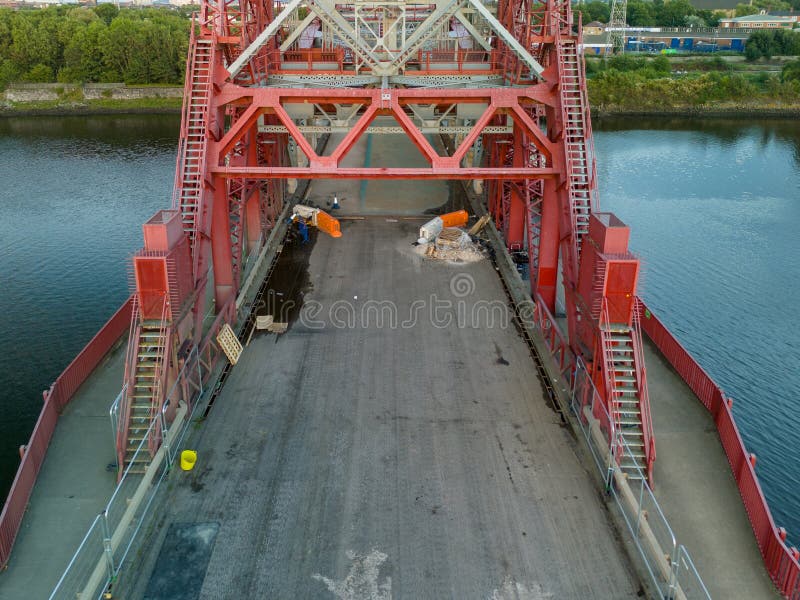 Construction Workers Repairing a Bridge Over River Stock Image - Image ...