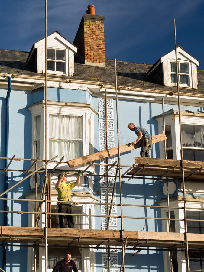 Construction Building Workers Repairing House Editorial Photo - Image ...