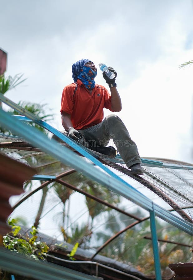 Construction Workers Resting, while Drinking a Cold Water during Break ...