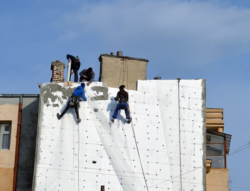 Construction Workers with Ropes on Side of Building Editorial Photo ...