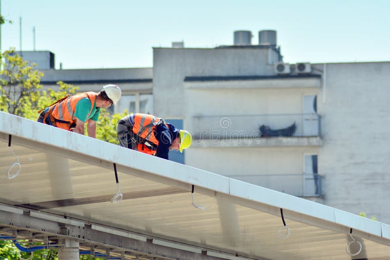 Construction Workers on a Scaffold. Editorial Photography - Image of ...