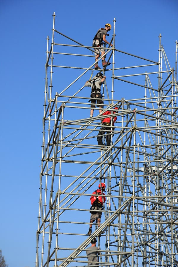 Scaffolding workers editorial photography. Image of group - 102368002