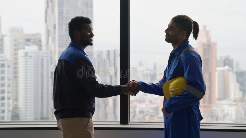 Handshake between Engineer Foreman Manager and Electrician Stock Image ...