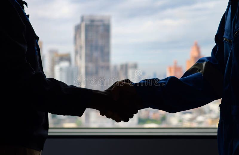 Handshake between Engineer Foreman Manager and Electrician Stock Image ...