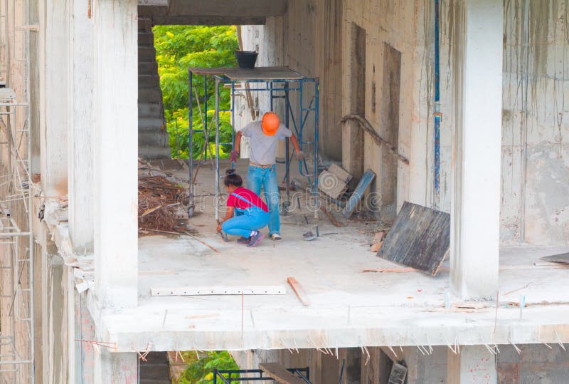 Construction Workers Site and Building of Housing at Laborer Work ...