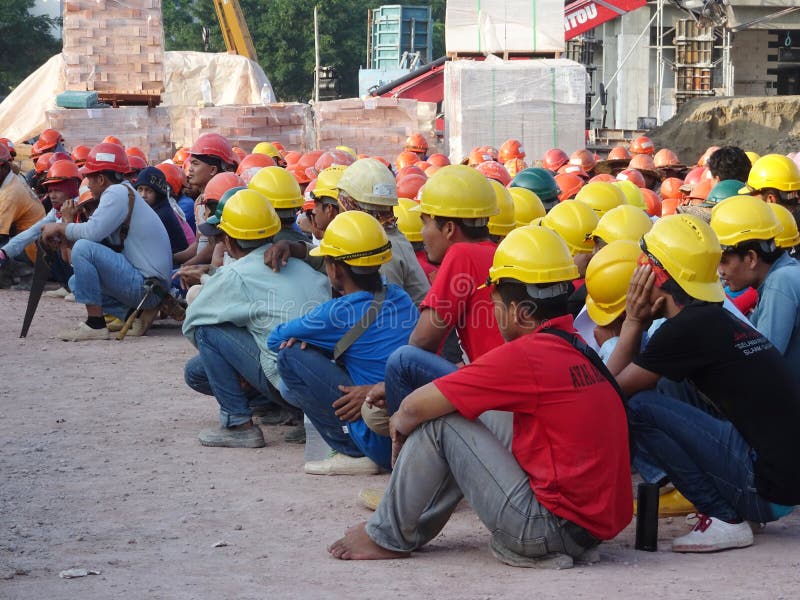 Construction Workers at the Construction Site Doing the daily Routine ...