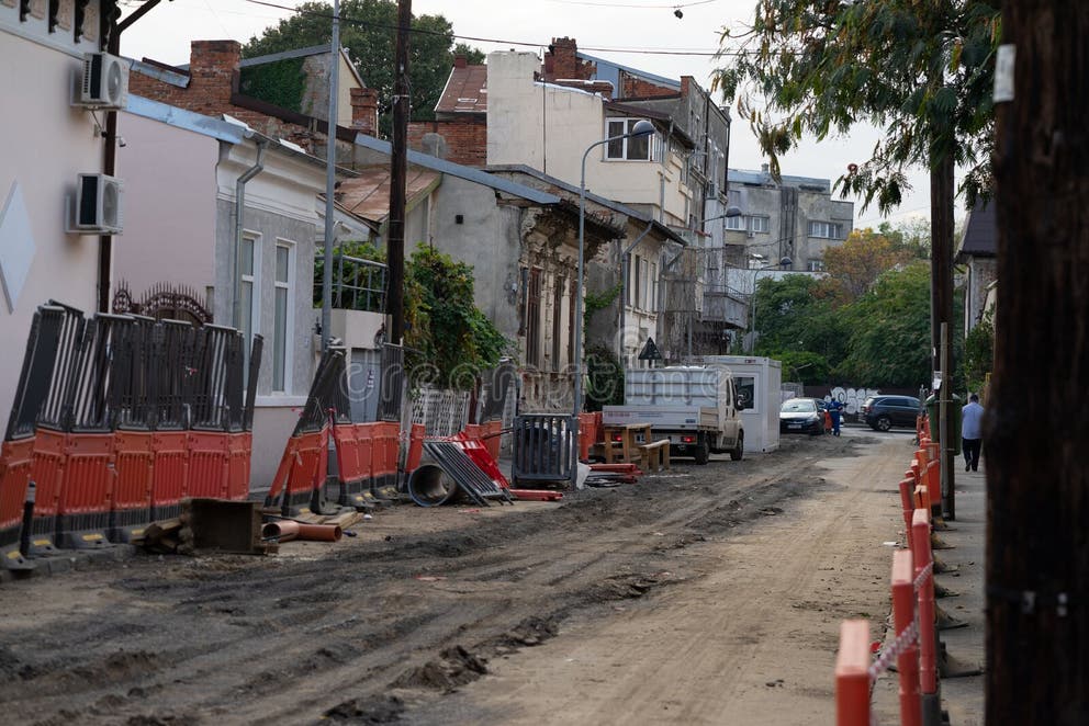 Construction Workers at Construction Site and Heavy Duty Bulldozer in ...