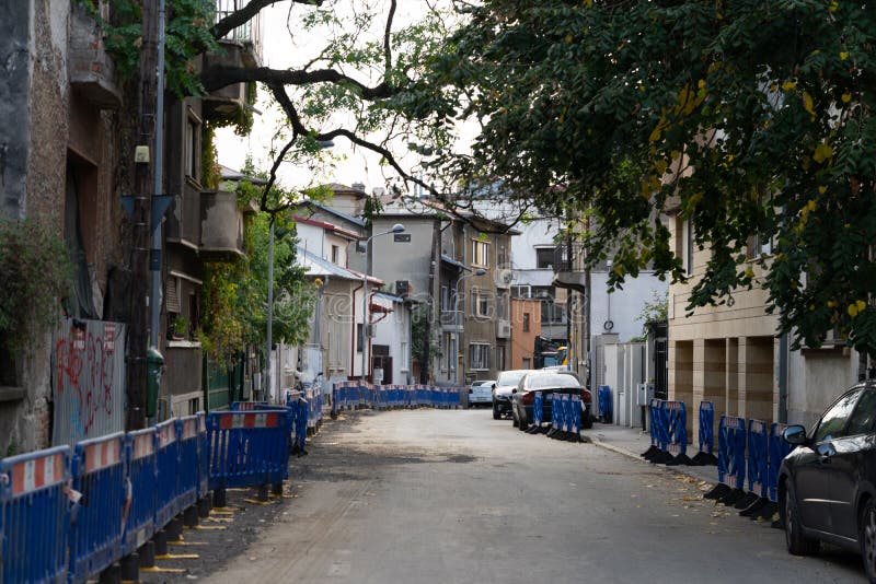 Construction Workers at Construction Site and Heavy Duty Bulldozer in ...