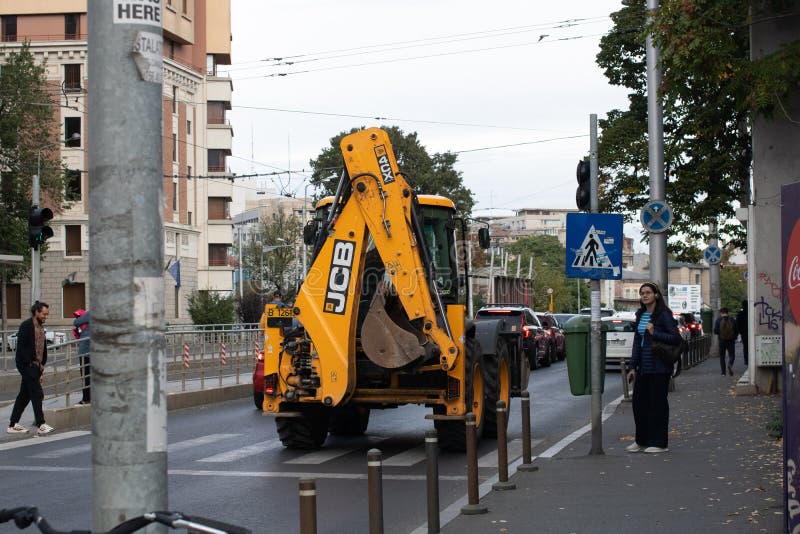 Construction Workers at Construction Site and Heavy Duty Bulldozer in ...