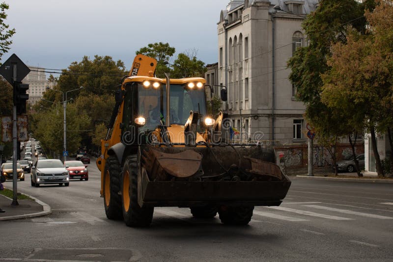 Construction Workers at Construction Site and Heavy Duty Bulldozer in ...