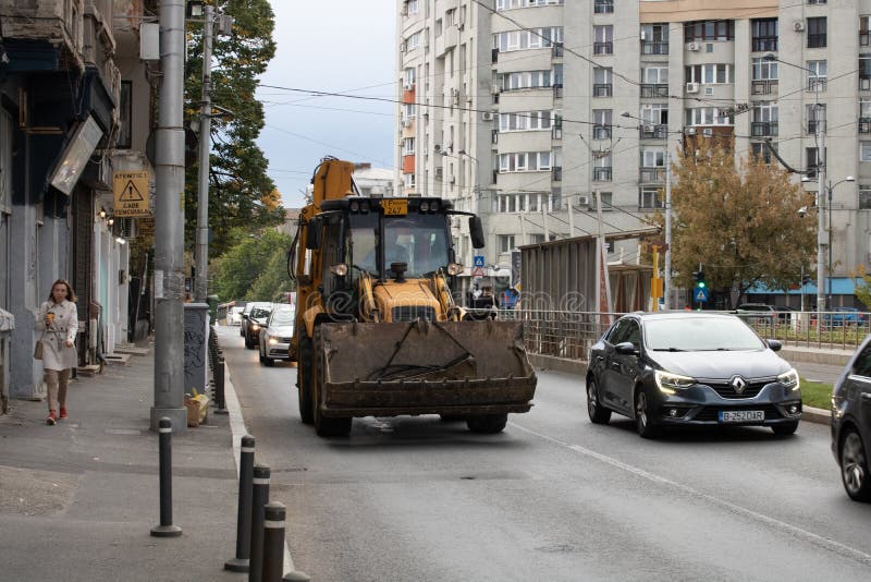 Construction Workers at Construction Site and Heavy Duty Bulldozer in ...