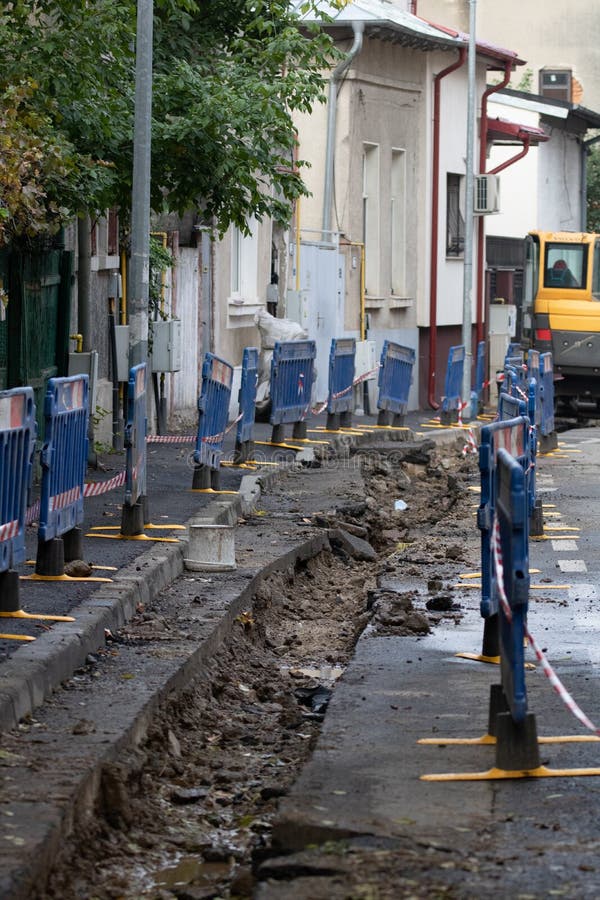Construction Workers at Construction Site and Heavy Duty Bulldozer in ...