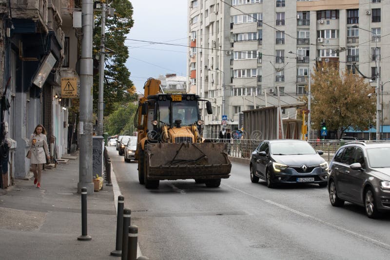 Construction Workers at Construction Site and Heavy Duty Bulldozer in ...