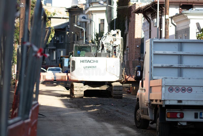 Construction Workers at Construction Site and Heavy Duty Bulldozer in ...