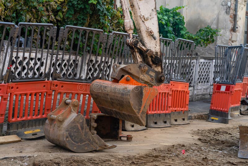 Construction Workers at Construction Site and Heavy Duty Bulldozer in ...