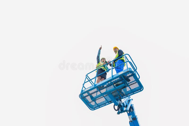 Construction Workers on Site in Hydraulic Lifting Ramp Stock Photo ...