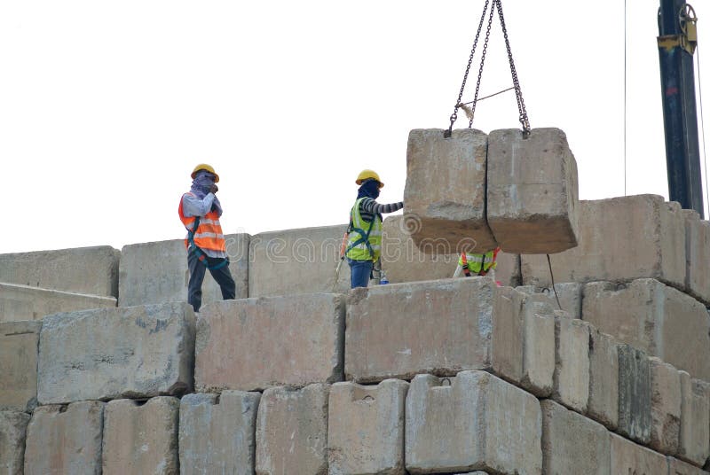 Construction Workers Stacking the Maintain Load Test Block at the ...