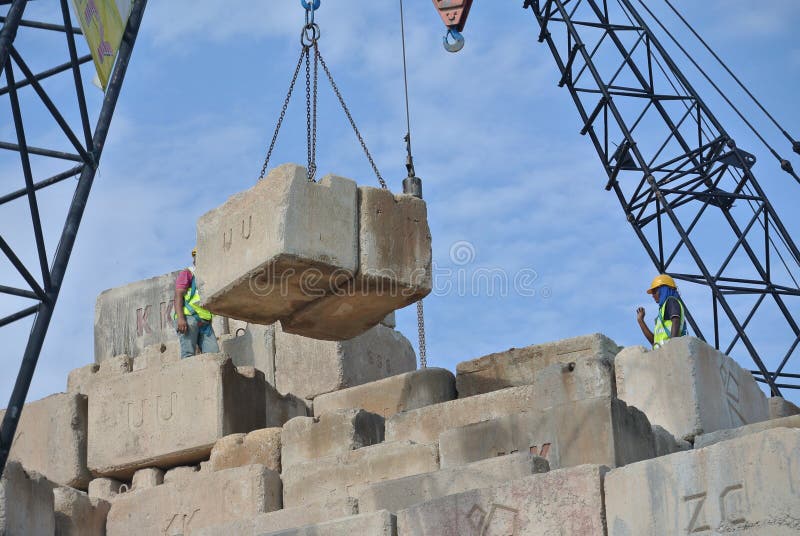 Construction Workers Stacking the Maintain Load Test Block at the ...